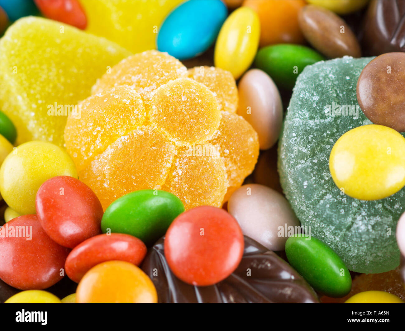 Mixed colorful candies background Stock Photo - Alamy