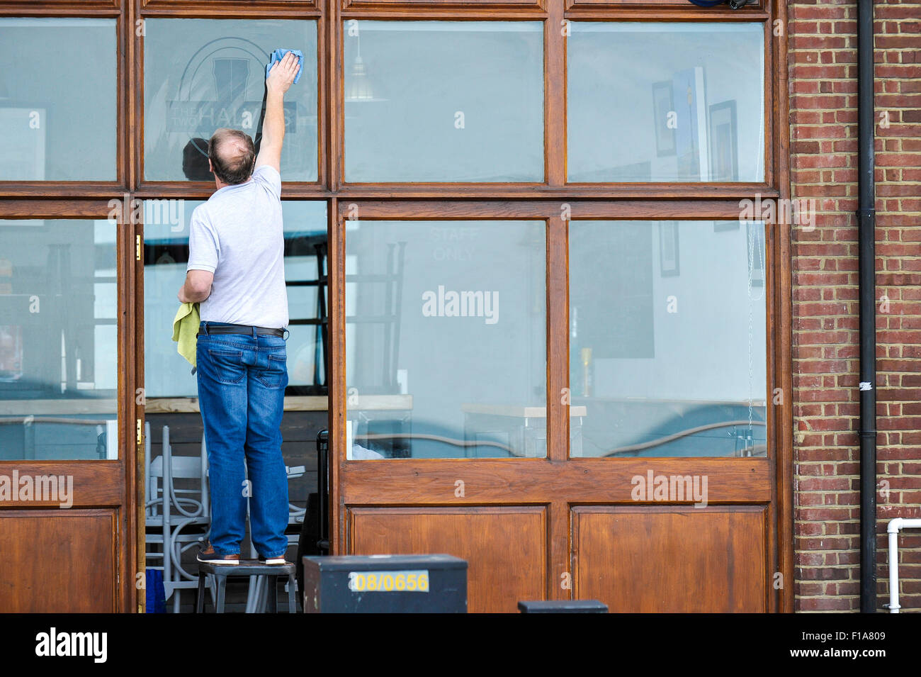 Man in windows hi-res stock photography and images - Alamy
