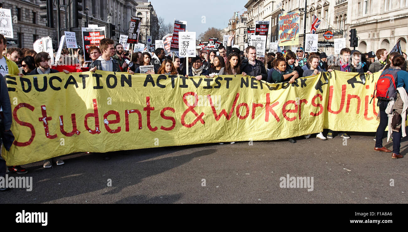 Protesters march past parliament to protest against rising tuition fees ...