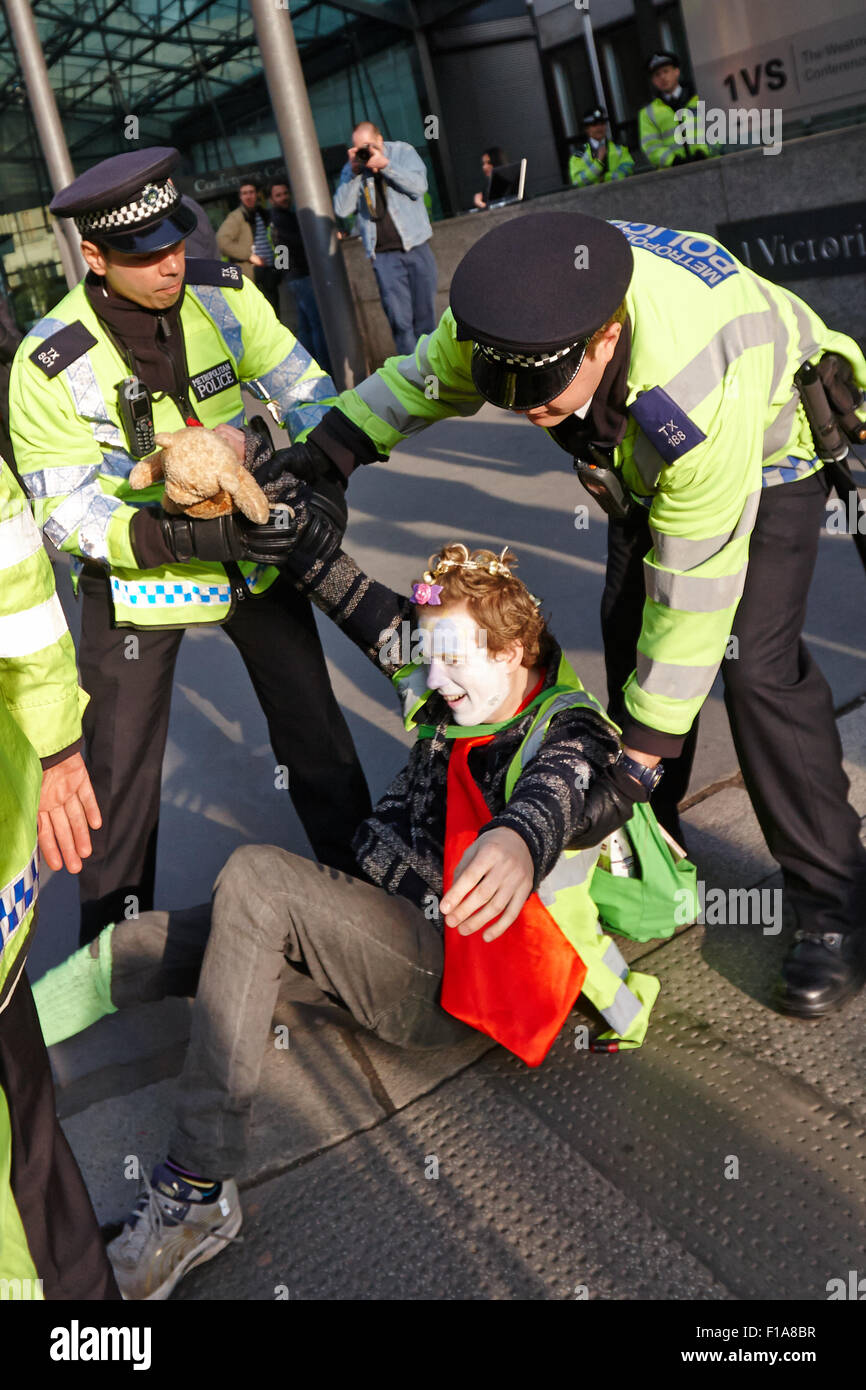 Protesters march past parliament to protest against rising tuition fees ...