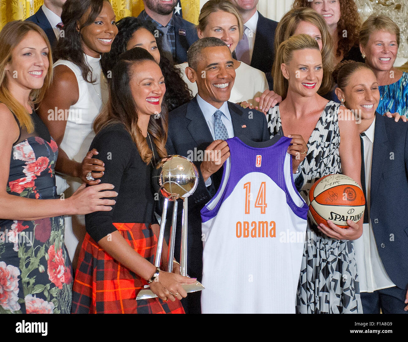 United States President Barack Obama poses for a group photo as he ...