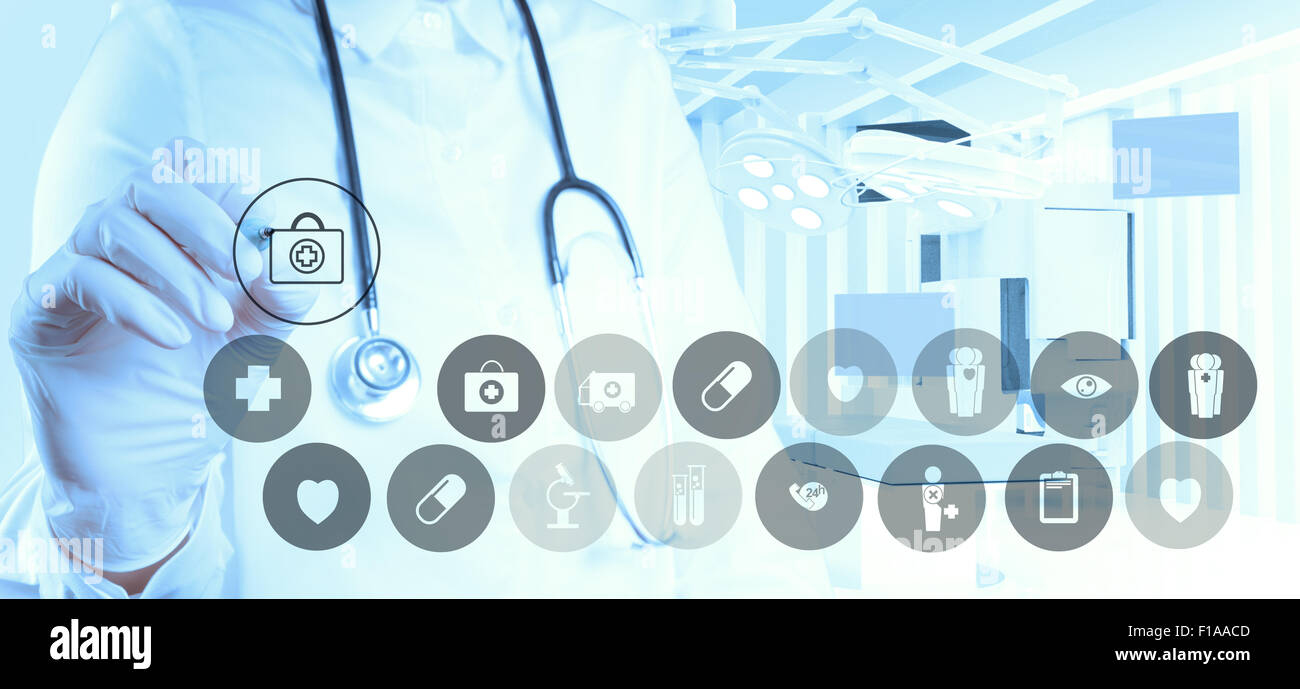 Medicine doctor hand working with modern computer interface as medical ...