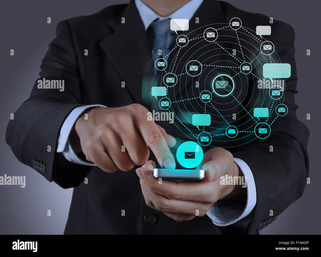businessman hand use smart phone computer with email icon as concept ...
