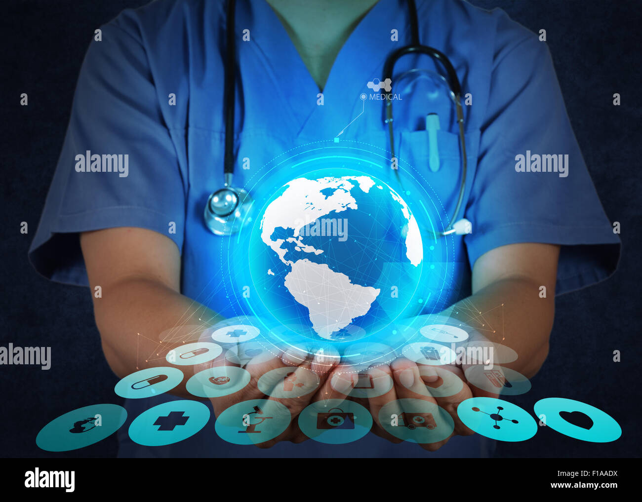 Medical Doctor holding a world globe in her hands as medical network ...
