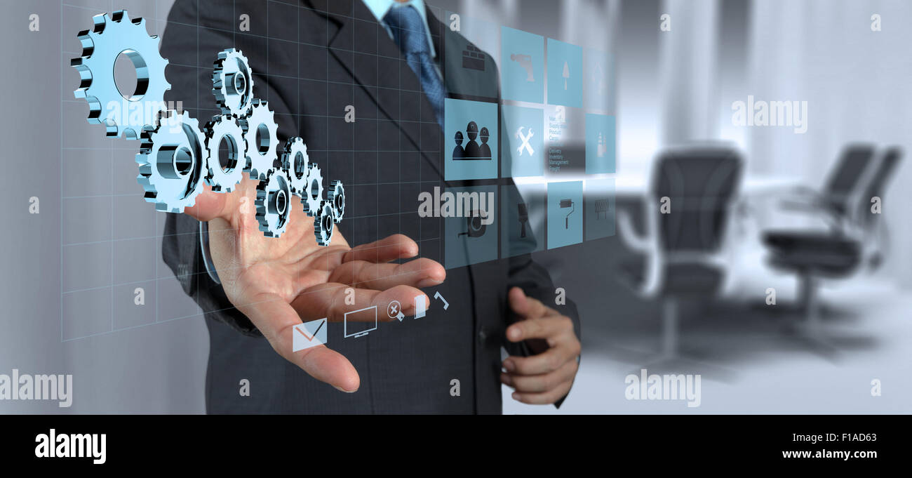 businessman hand draws gear to success concept Stock Photo - Alamy