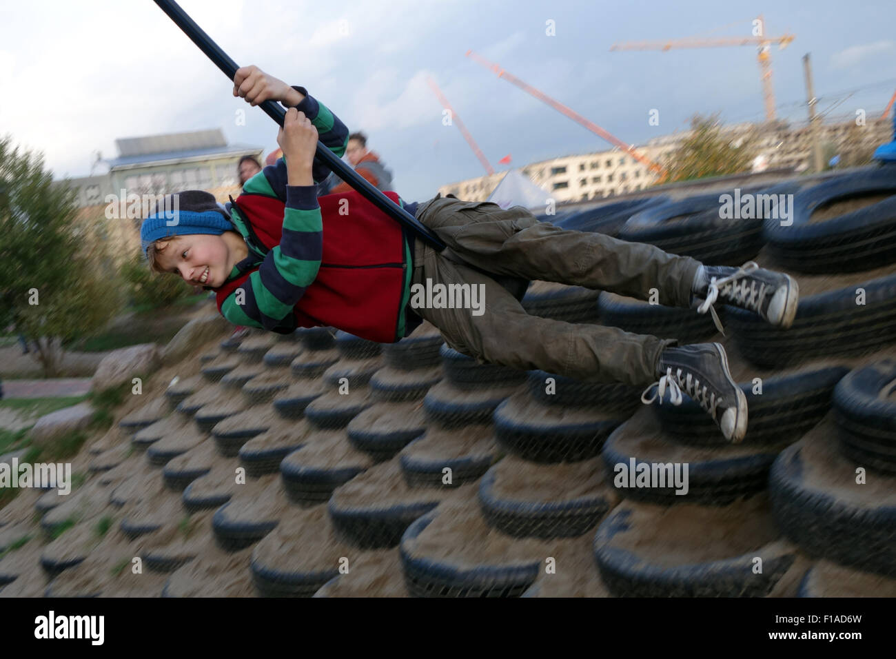 Rostock, Germany, boy rocking on a playground Stock Photo - Alamy