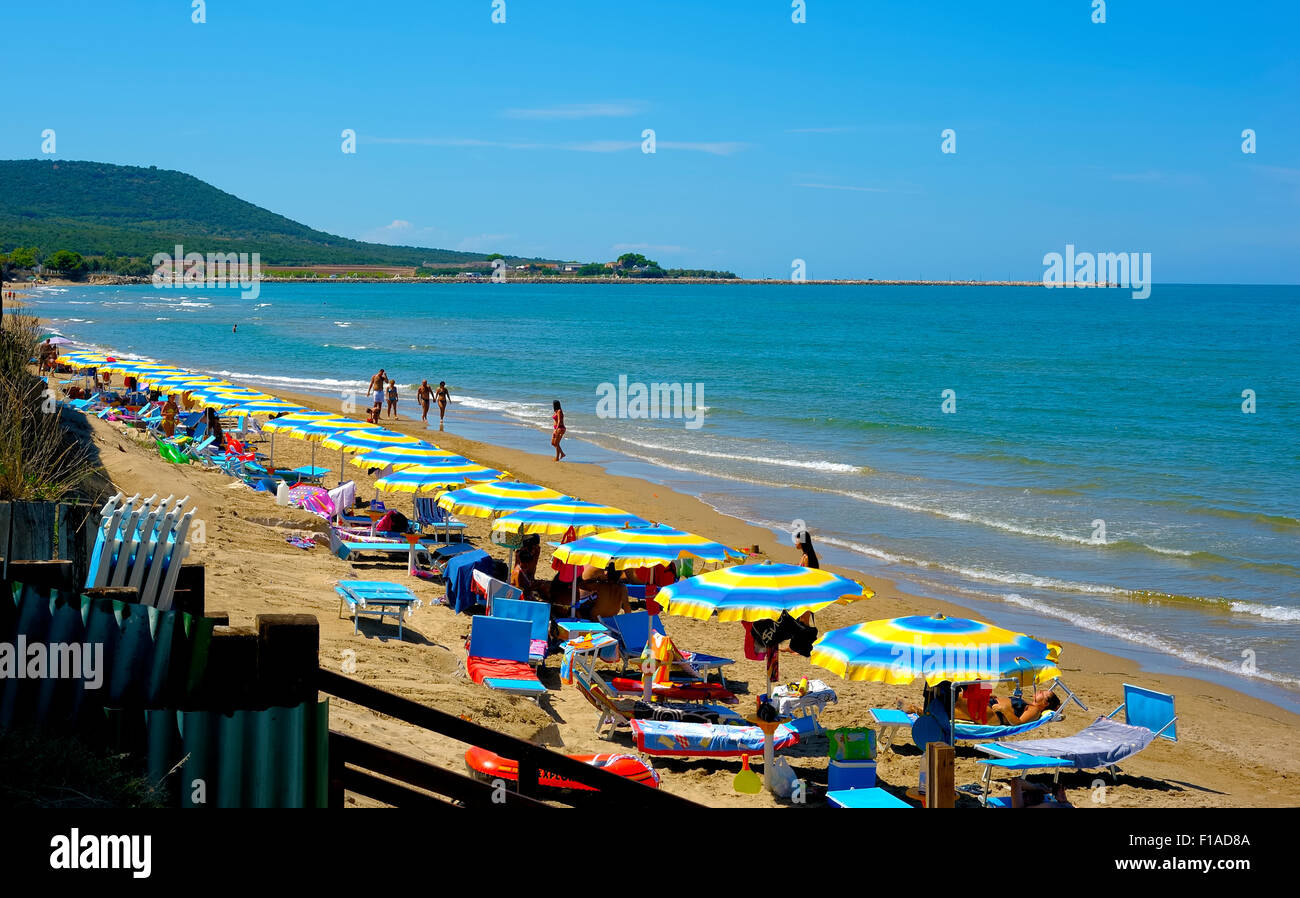 Apulia, ITALY, AUGUST 18: Beach with umbrellas and unidentified people ...