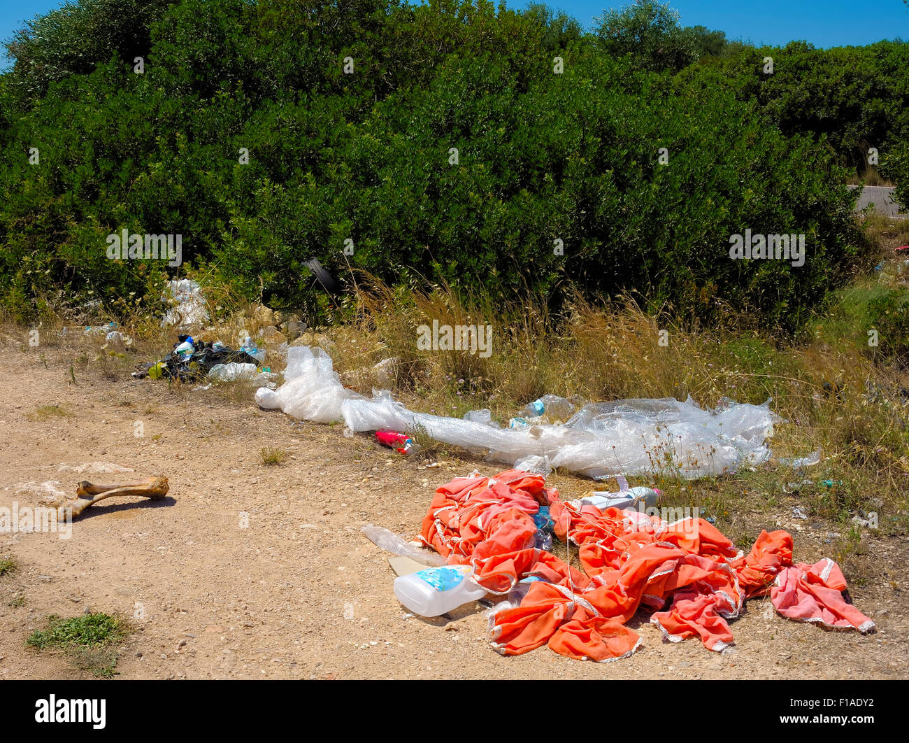 Rubbish and abandoned hazardous waste in a country road Stock Photo - Alamy