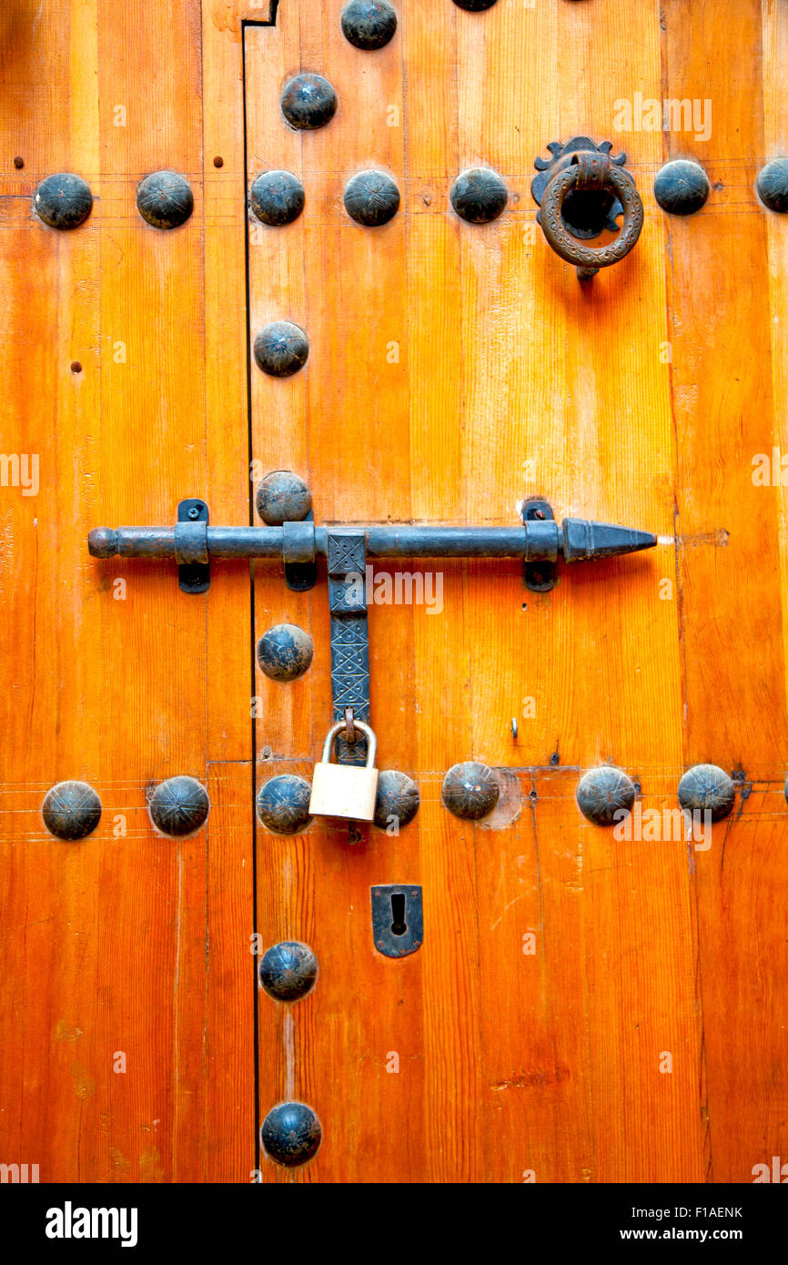 brown morocco in africa the old wood facade home and rusty safe padlock ...