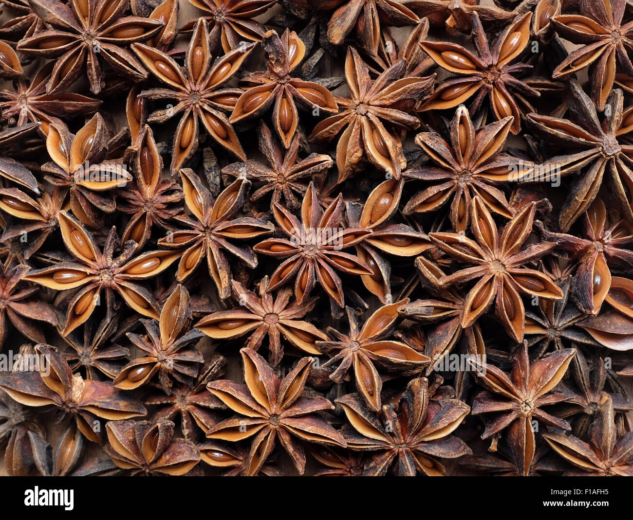 Aromatic star anise as an abstract background texture Stock Photo - Alamy