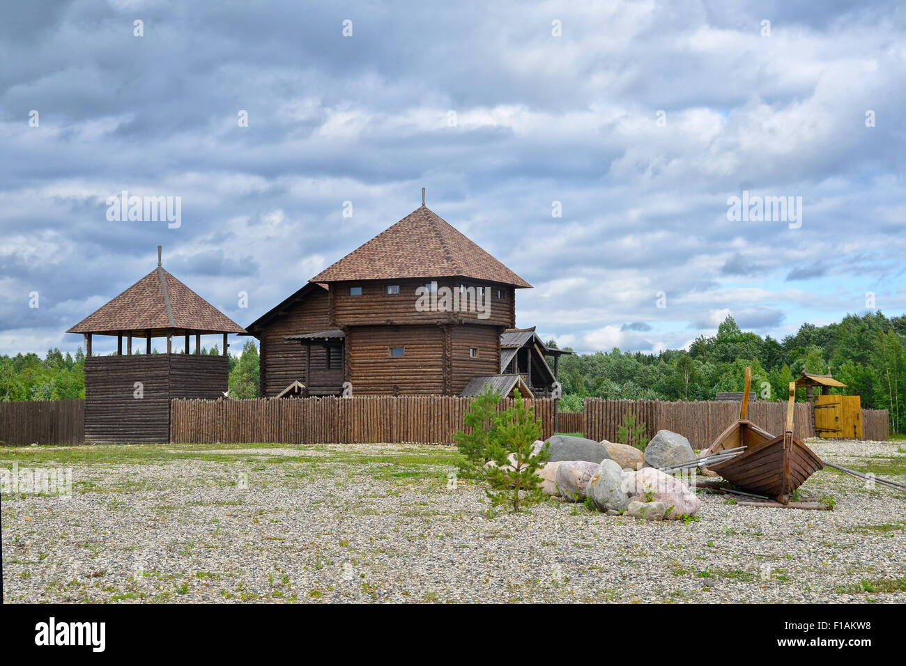 The wooden fortress with palisades and a boat near Stock Photo - Alamy