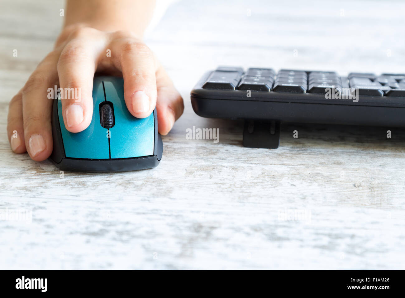 Woman hand clicking wireless mouse hi-res stock photography and images ...
