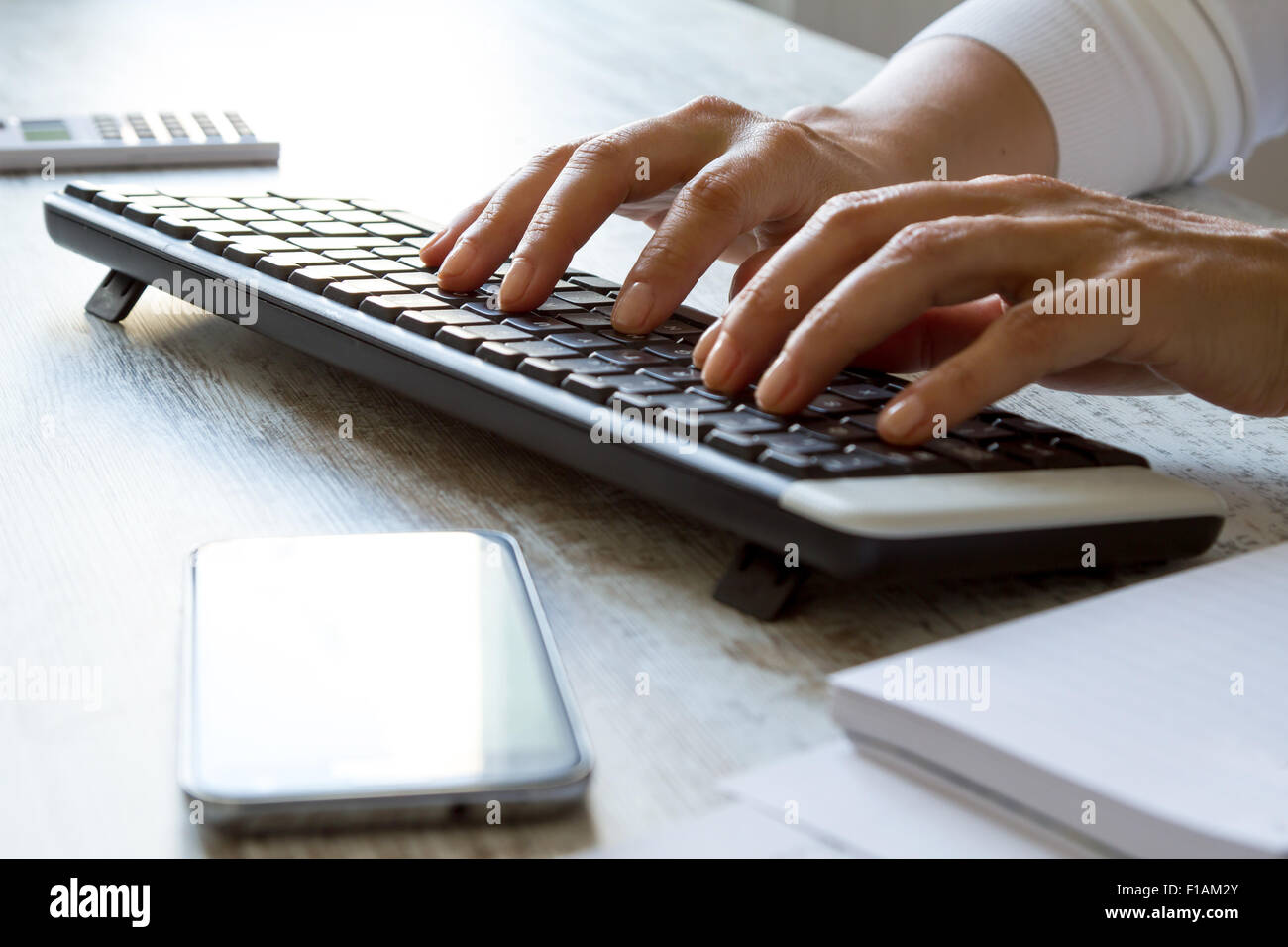 Working at the office with the computer Stock Photo - Alamy