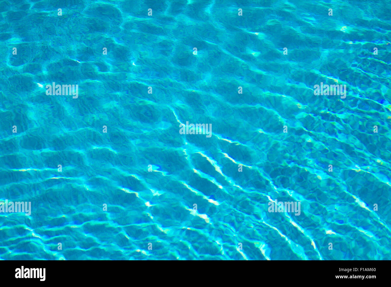 Water on a tiled swimming pool background Stock Photo - Alamy