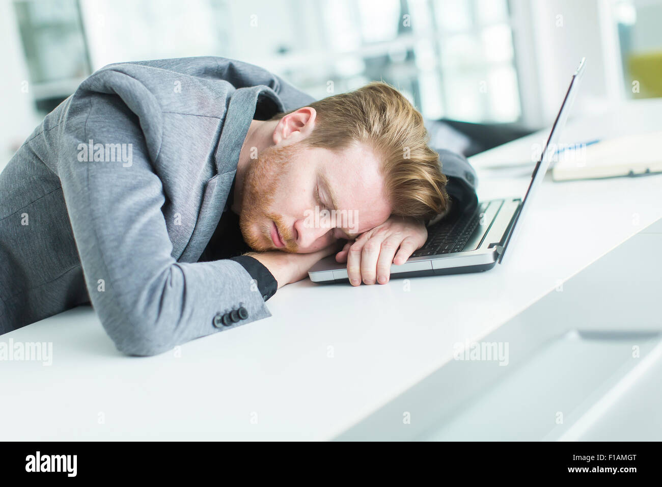 Man sleeping keyboard in computer hi-res stock photography and images ...