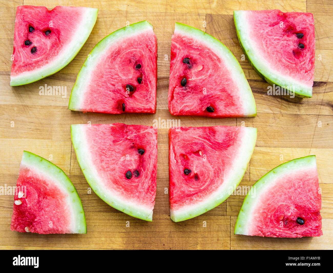 Watermelon slices arranged in a circle shape and around Stock Photo - Alamy