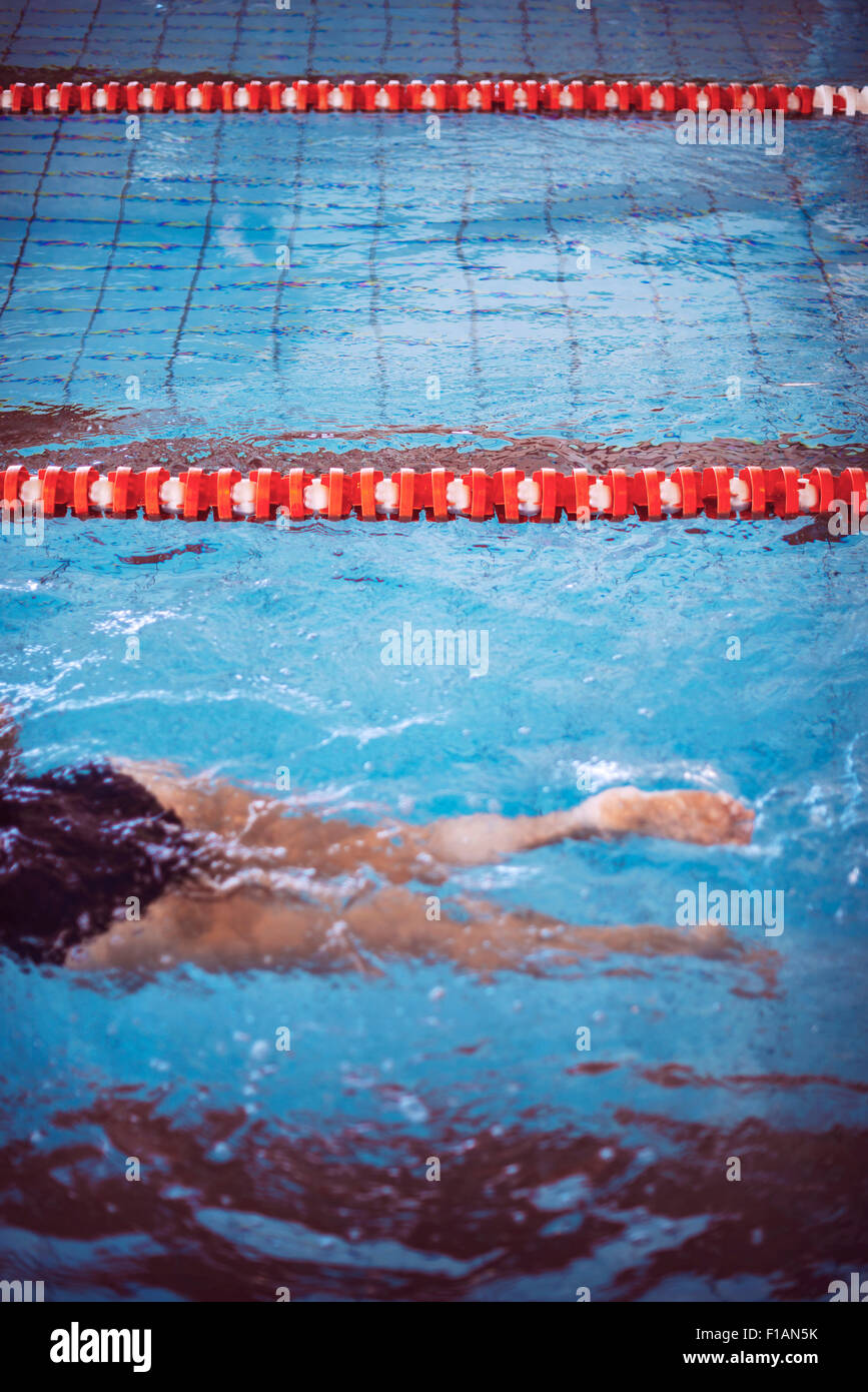 Female swimmer in indoor pool Stock Photo - Alamy