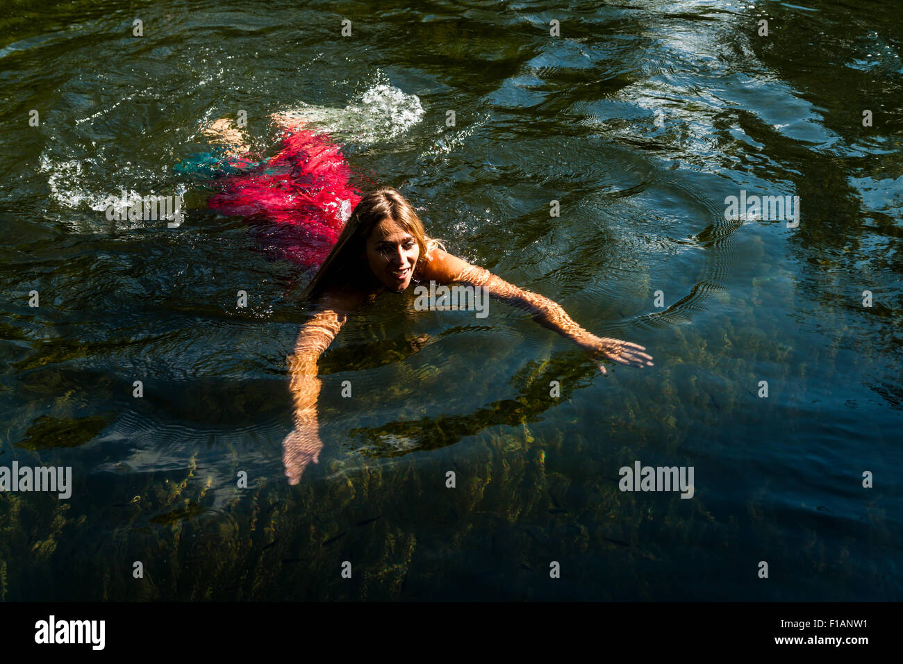 Bathing with dress hi-res stock photography and images - Alamy