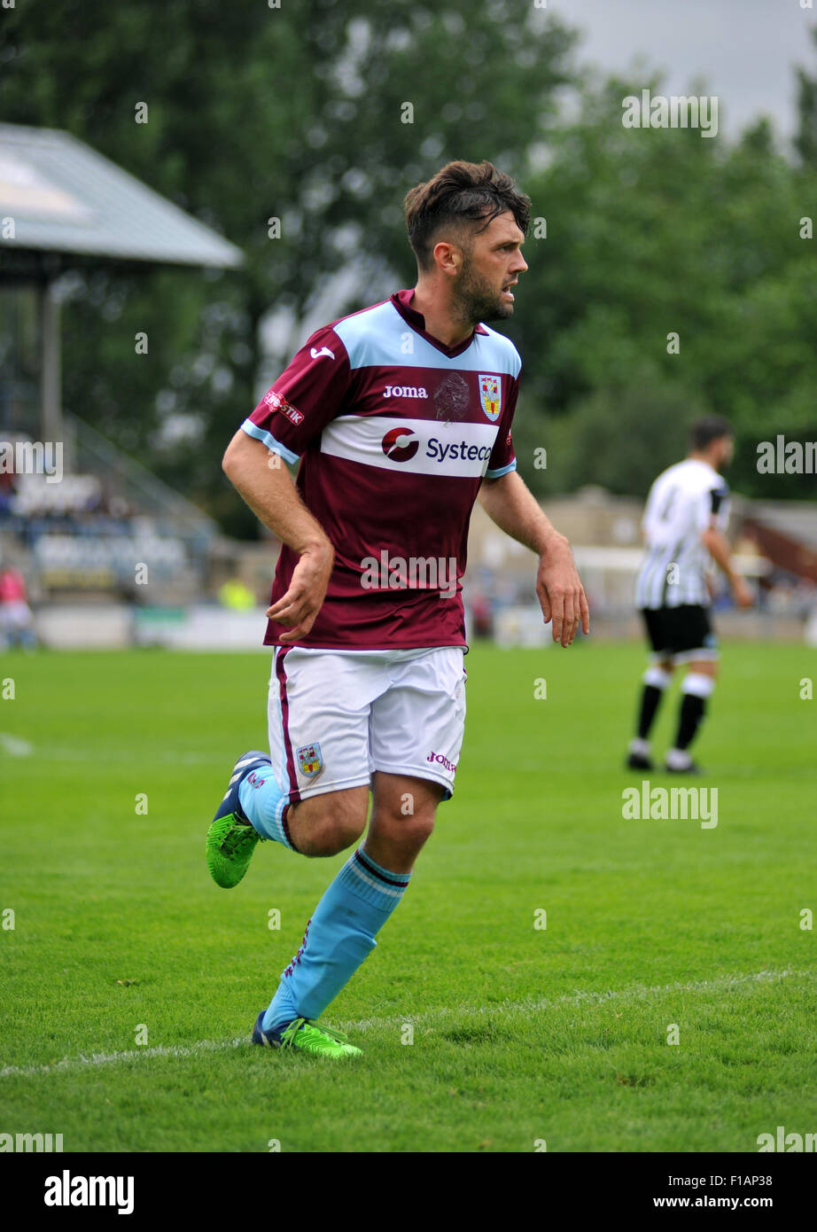 Dorchester, England. 31st August 2015. Adam Kelly in action for ...