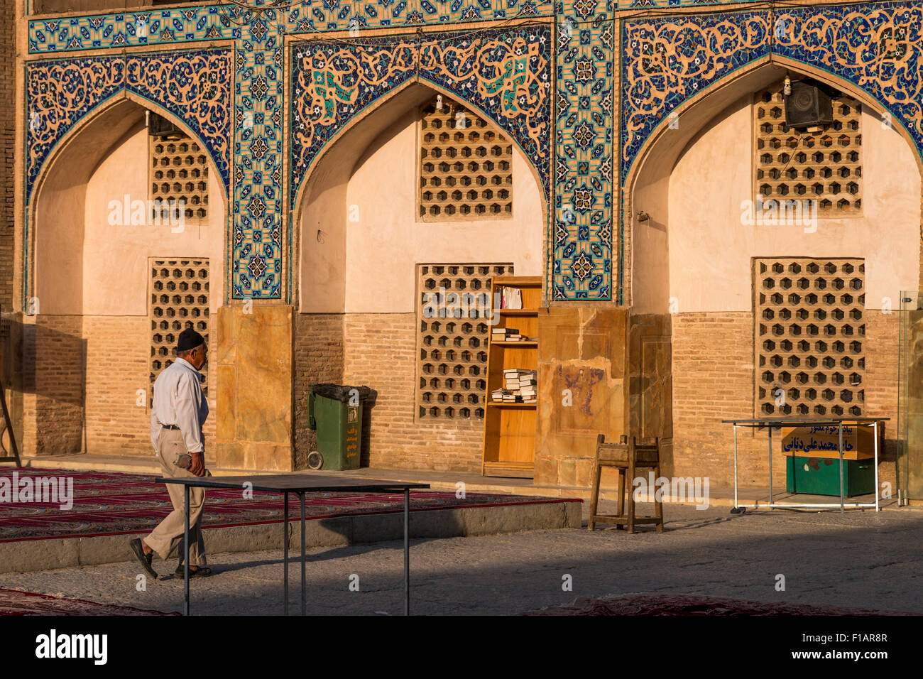 Man inside the mosque in Isfahan, Iran Stock Photo - Alamy