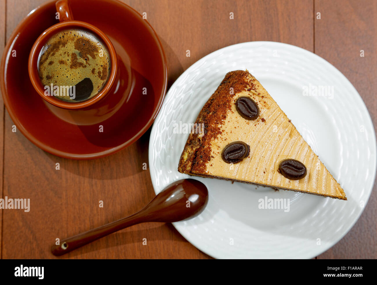 cake with a cup of coffee on the table Stock Photo - Alamy