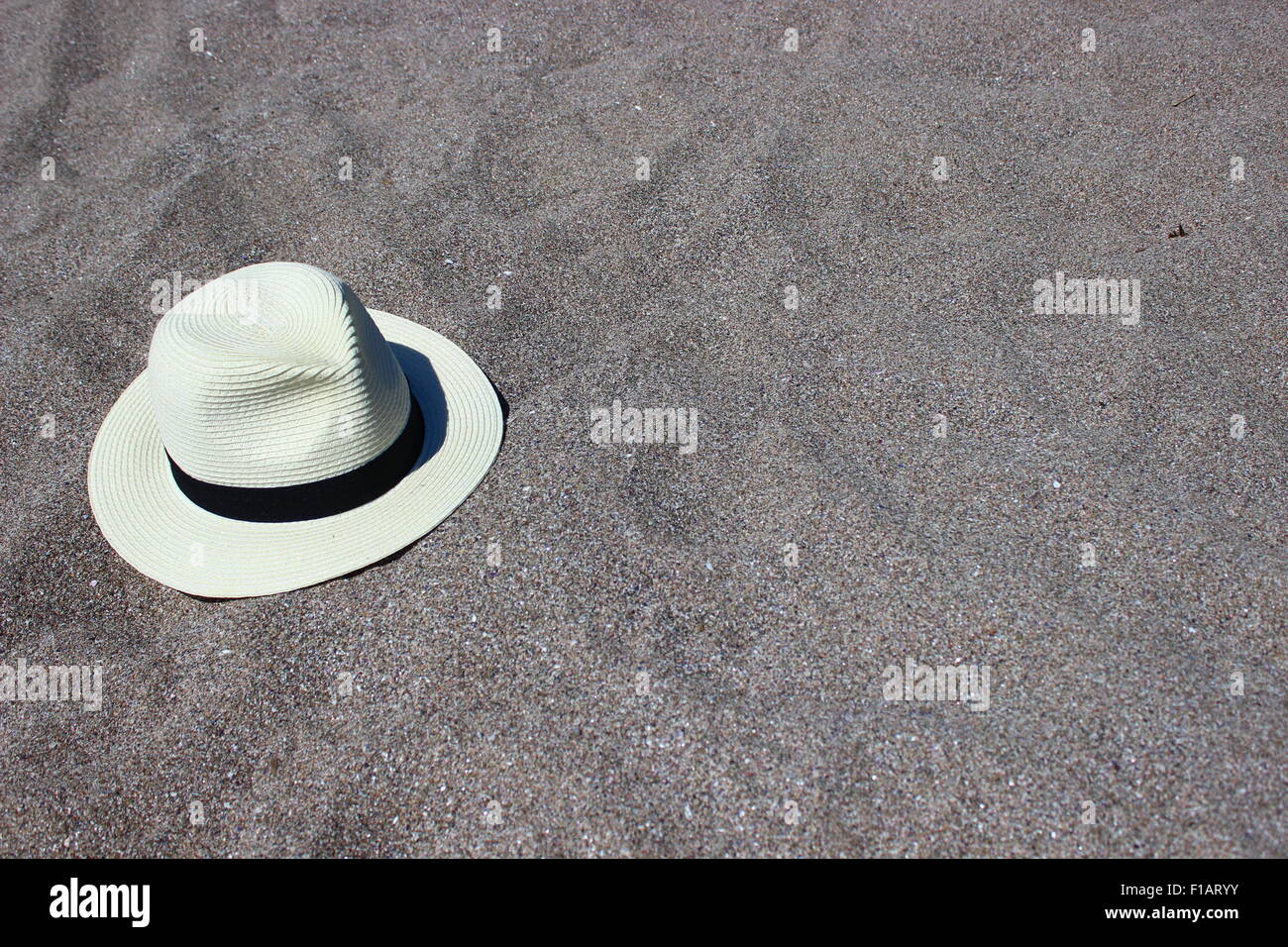 The case of the sand hat Stock Photo - Alamy