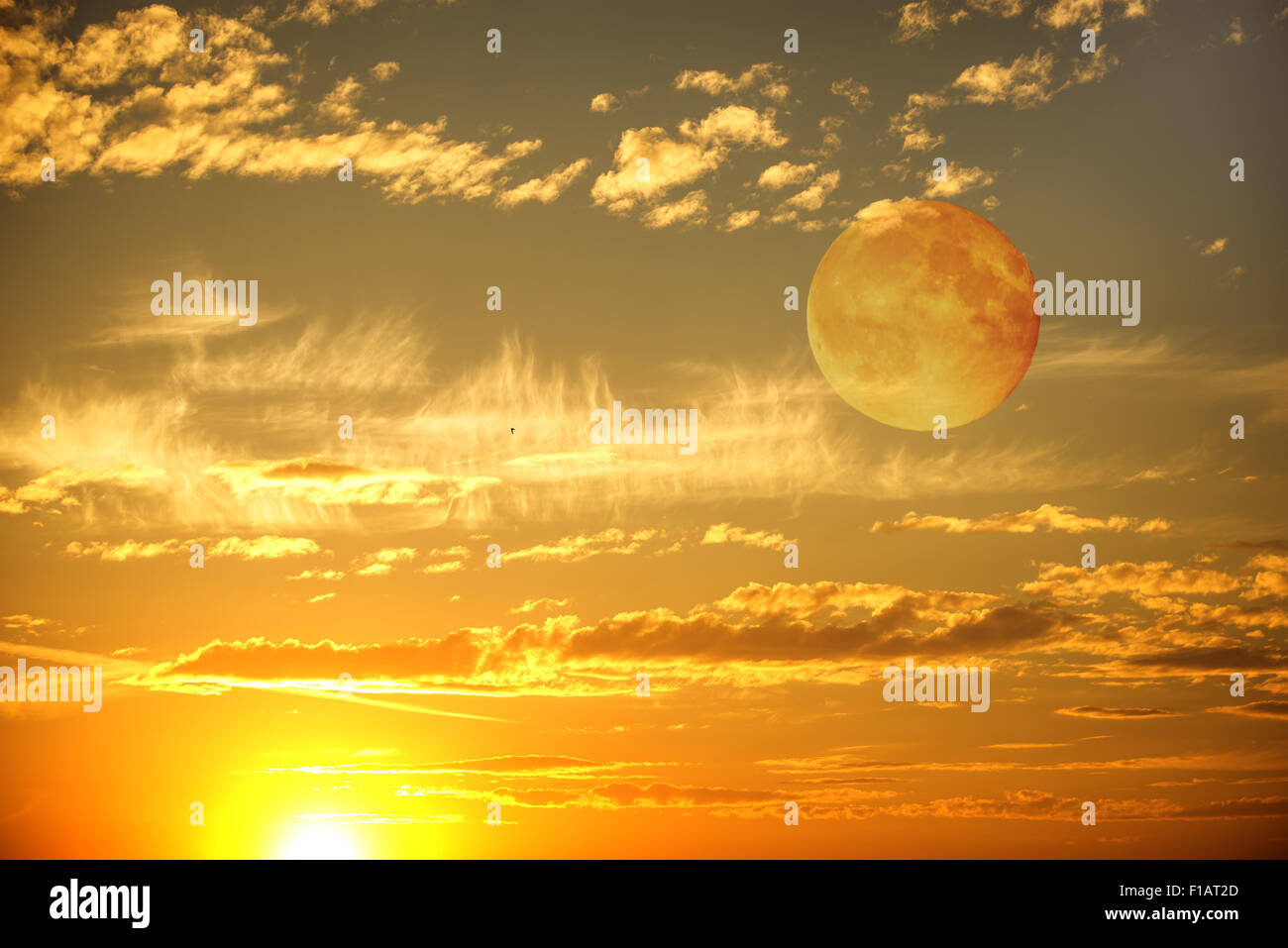 Evening sunset sky with the colorful clouds and moon Stock Photo - Alamy