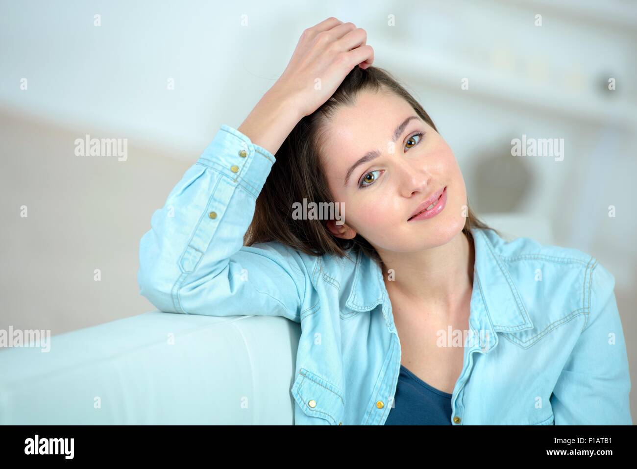 Young woman at home alone Stock Photo - Alamy