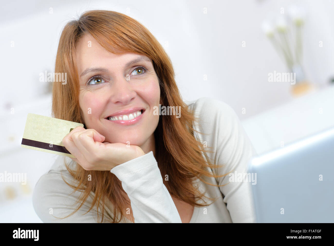 Woman doing some on-line shopping Stock Photo - Alamy