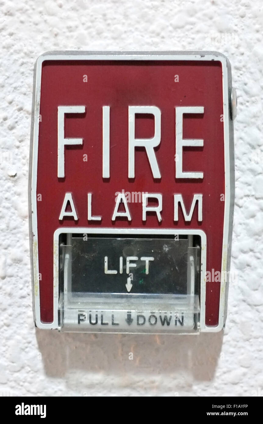 Fire alarm on white wall Stock Photo - Alamy