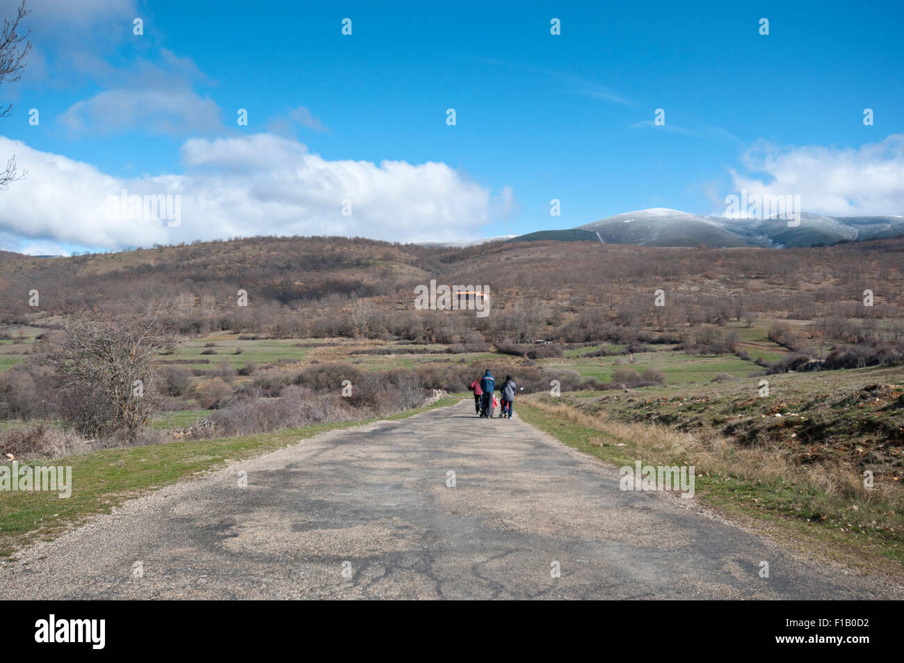 Family walking. Picture taken in San Millan de Lara, Burgos Province ...