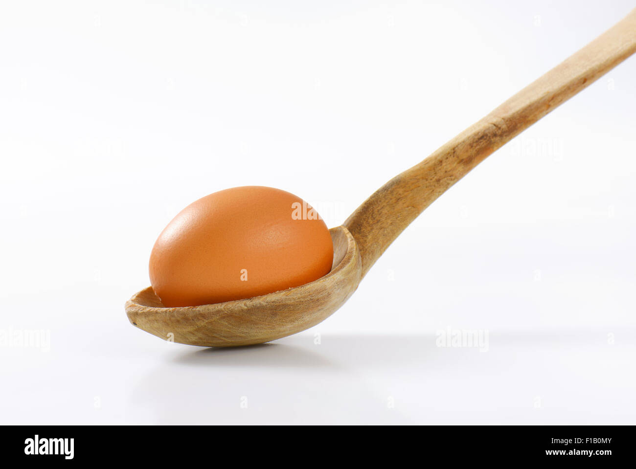 Spoon and egg hi-res stock photography and images - Alamy
