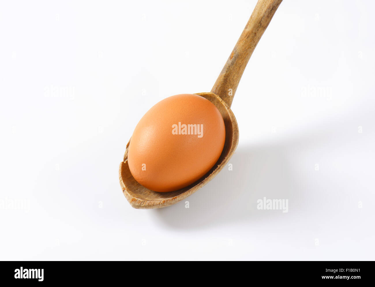 Spoon and egg hi-res stock photography and images - Alamy