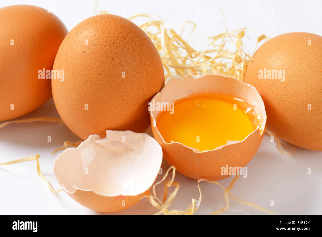Raw brown eggs hi-res stock photography and images - Alamy