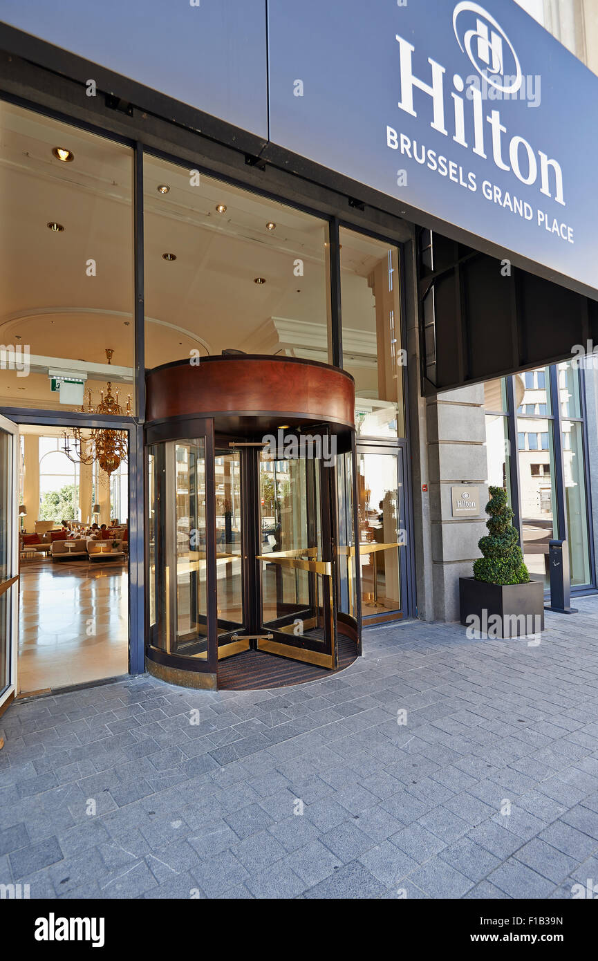 The main entrance and the Glass revolving door at Hotel Hilton Grand ...