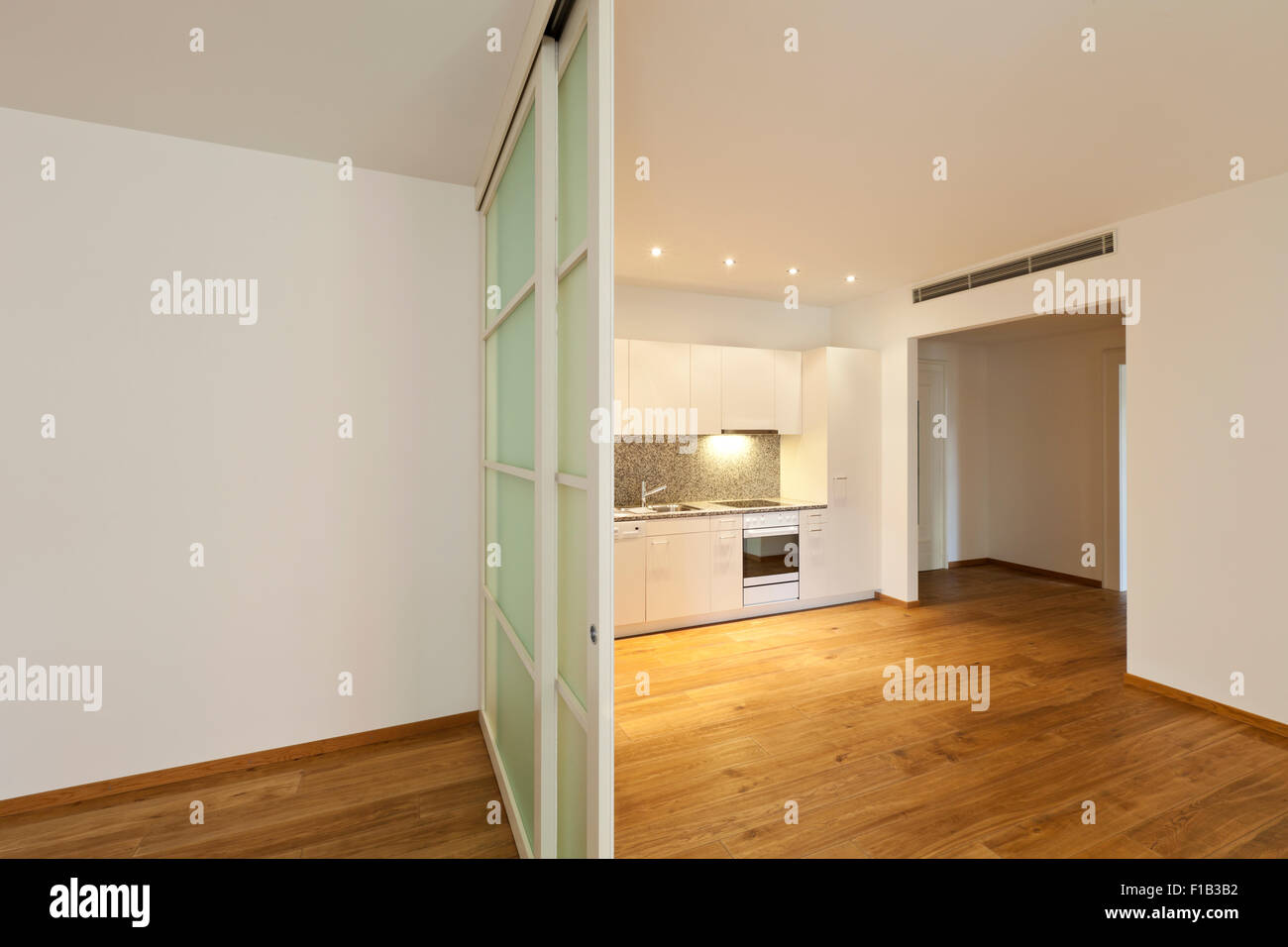 interior empty house with wooden floor, kitchen Stock Photo - Alamy