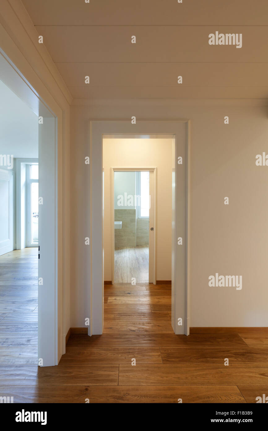 interior empty house with wooden floor, passage Stock Photo - Alamy