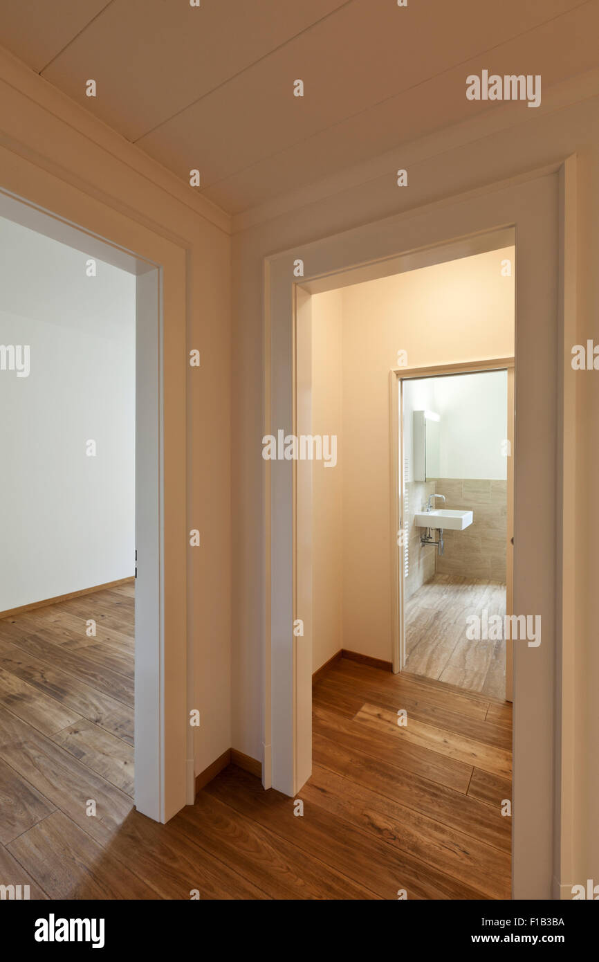 interior empty house with wooden floor, passage Stock Photo - Alamy