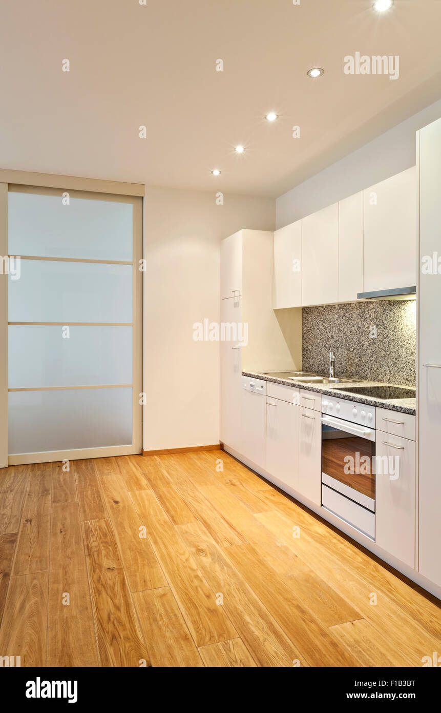 interior empty house with wooden floor, kitchen Stock Photo - Alamy