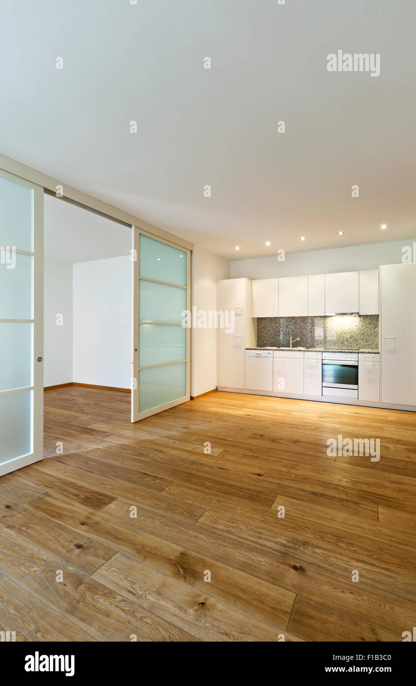 interior empty house with wooden floor, kitchen view Stock Photo - Alamy