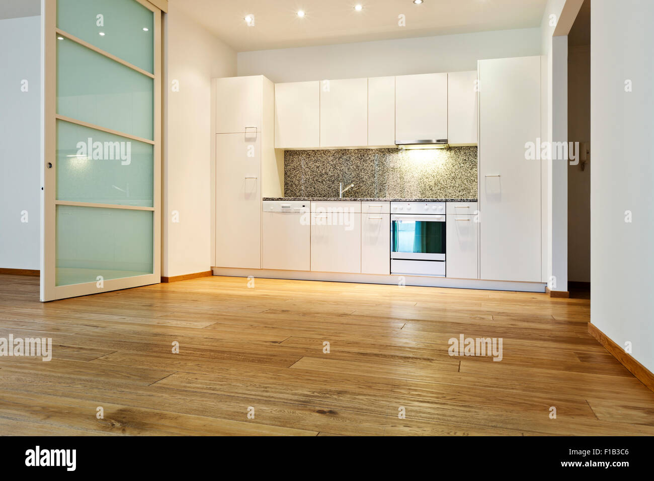 interior empty house with wooden floor, kitchen view Stock Photo - Alamy