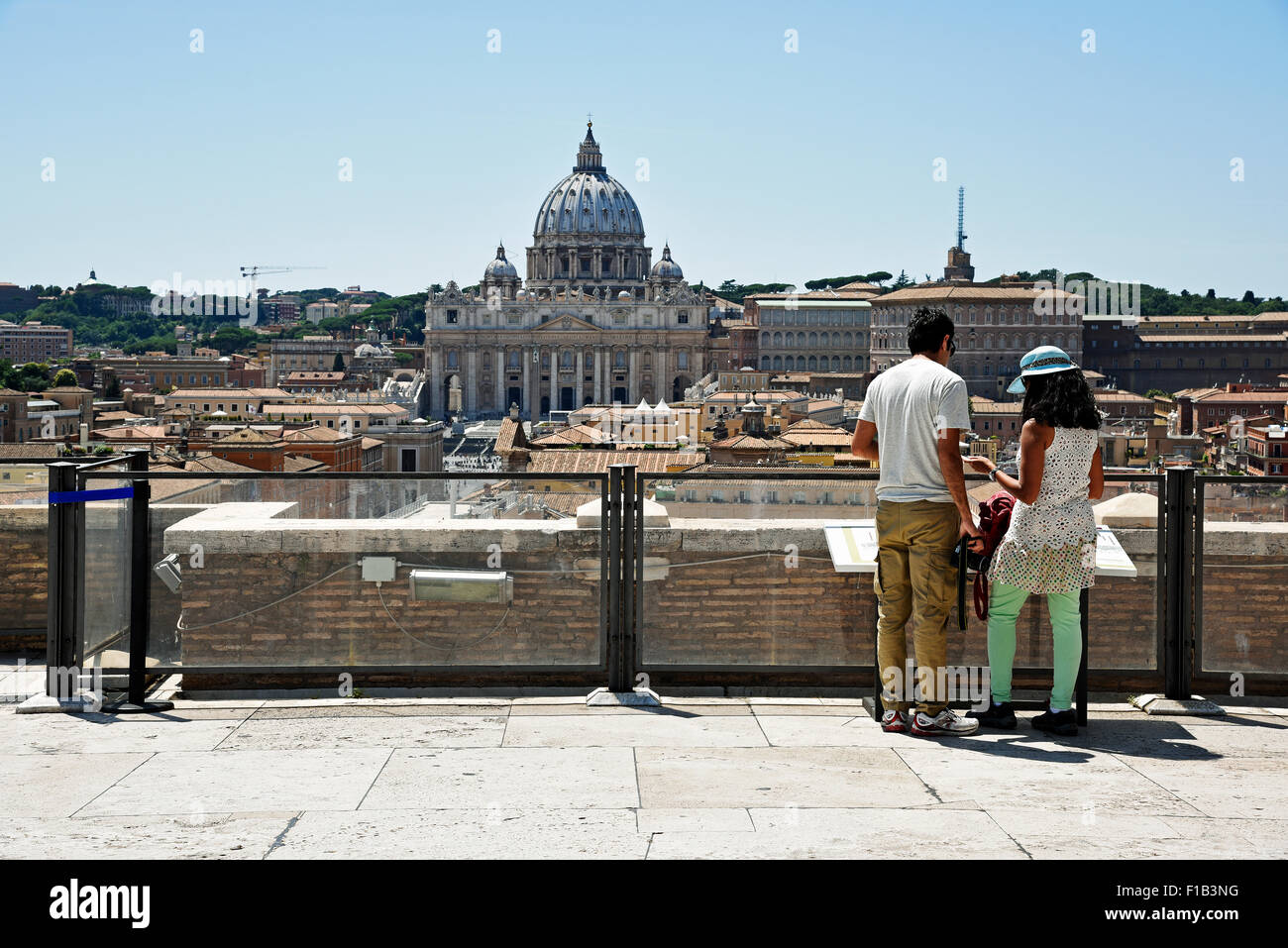 Tourists, view from the Castel Sant'Angelo to St. Peter's Basilica ...