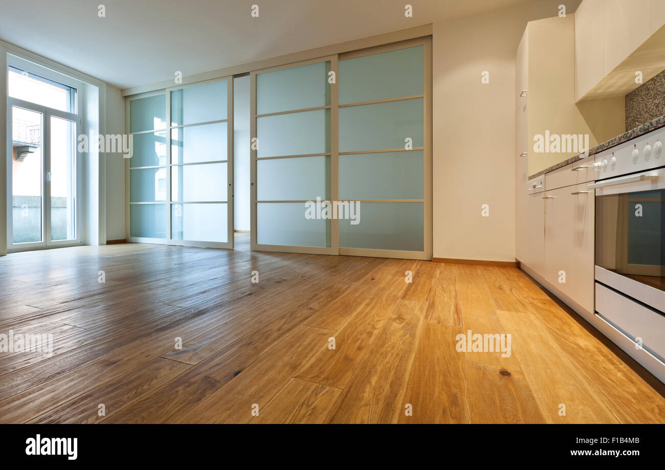 interior empty house with wooden floor, kitchen Stock Photo - Alamy