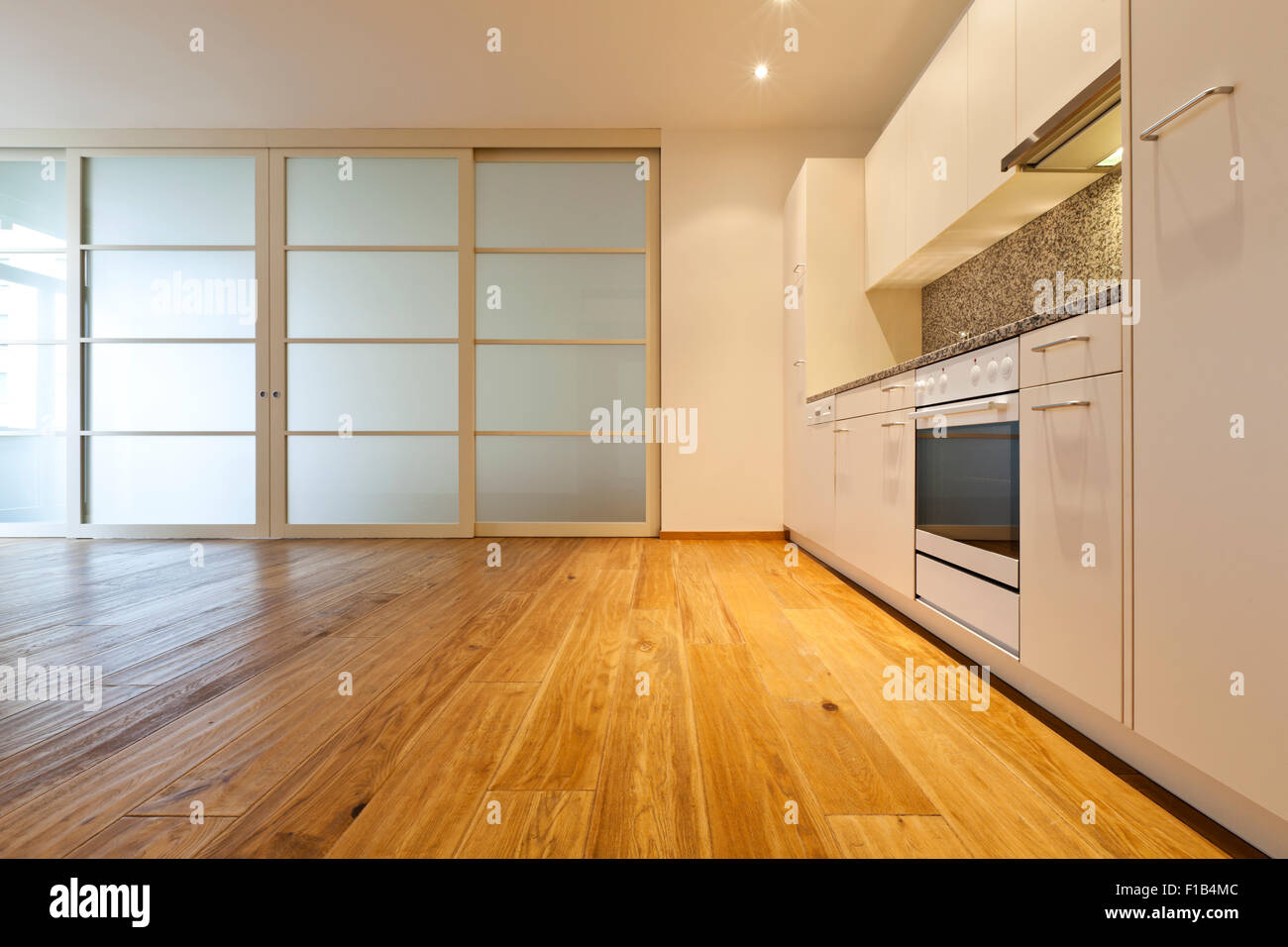 interior empty house with wooden floor, kitchen Stock Photo - Alamy