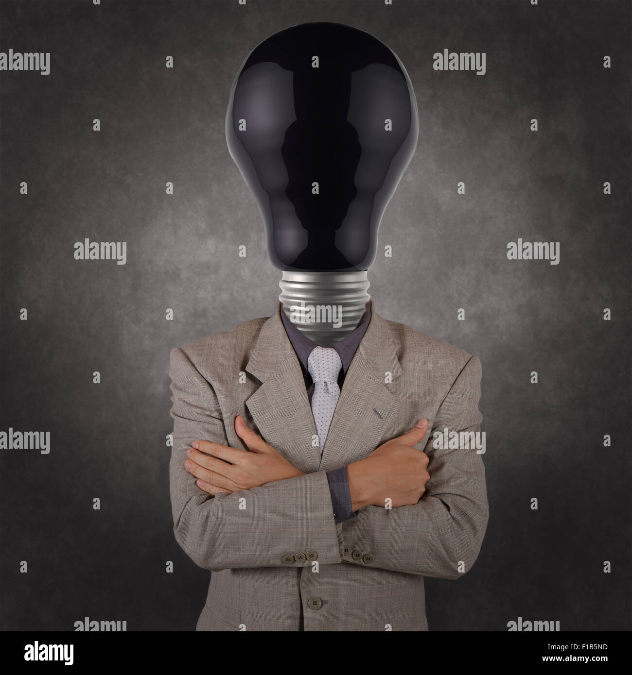 businessman with black light bulb head as concept Stock Photo - Alamy