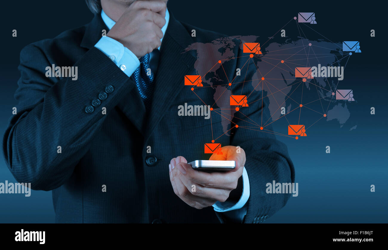 businessman hand use smart phone computer with modern email icon as ...