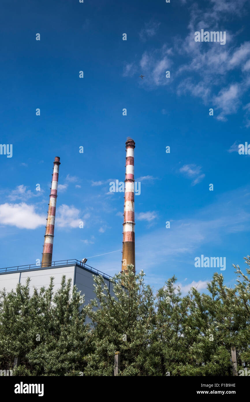 The twin chimney stacks of the Poolbeg electricity generating station ...