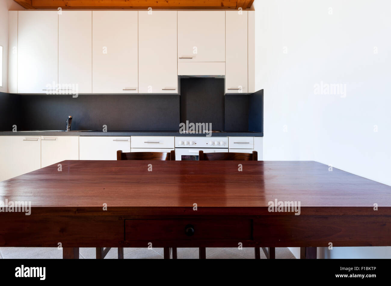 Wooden kitchen table hi-res stock photography and images - Alamy