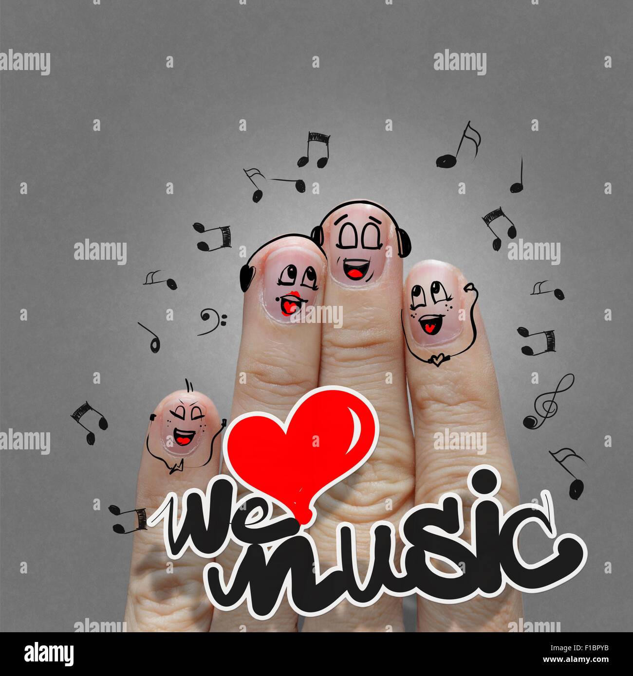 the happy finger family holding we love music and sing a song Stock ...