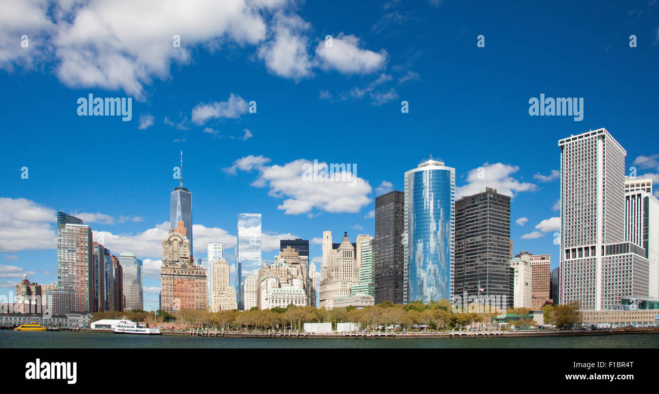 Downtown Manhattan skyline with bright blue sky Stock Photo - Alamy